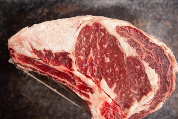 Garlic Butter Prime Rib - The Roasted Root