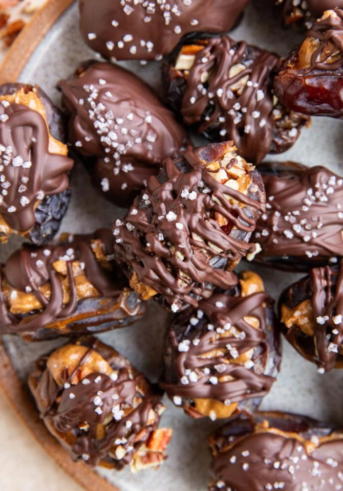 Chocolate Covered Almond Butter Stuffed Dates - The Roasted Root