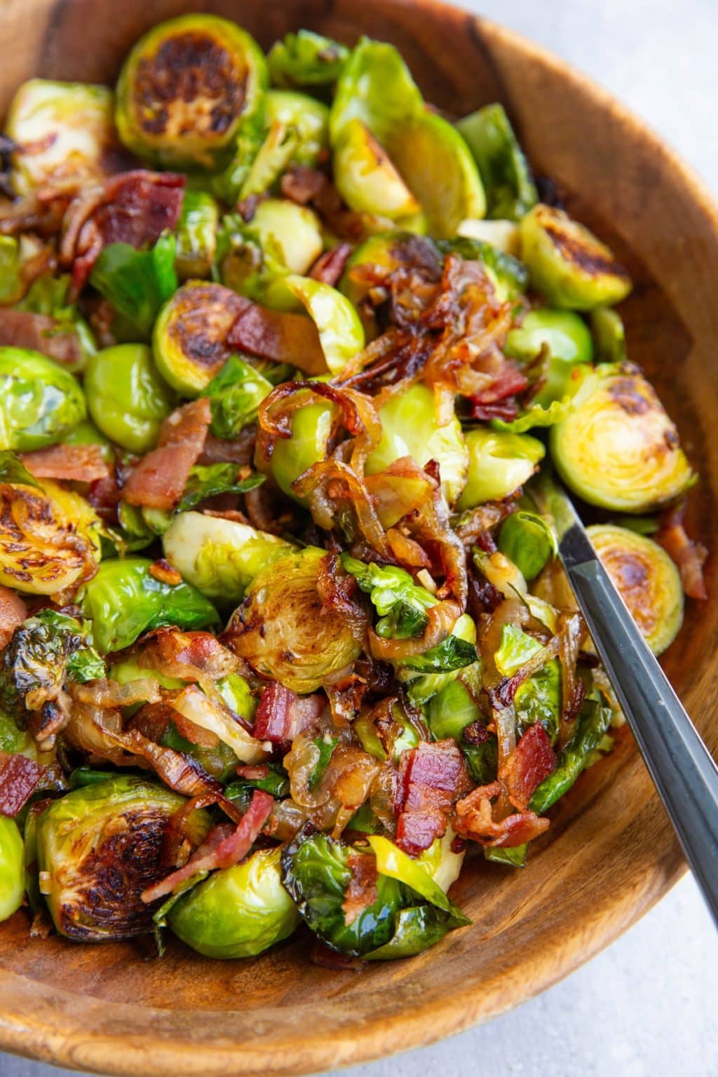 Brussel Sprouts with Caramelized Onions and Bacon - The Roasted Root