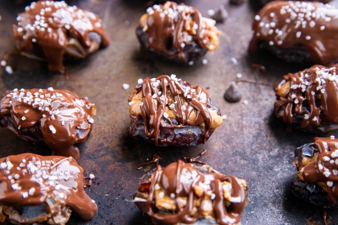 Date Snickers Recipe (Peanut Butter Stuffed Dates) - The Roasted Root