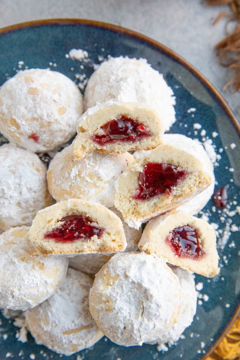 Raspberry Filled Snowball Cookies - The Roasted Root